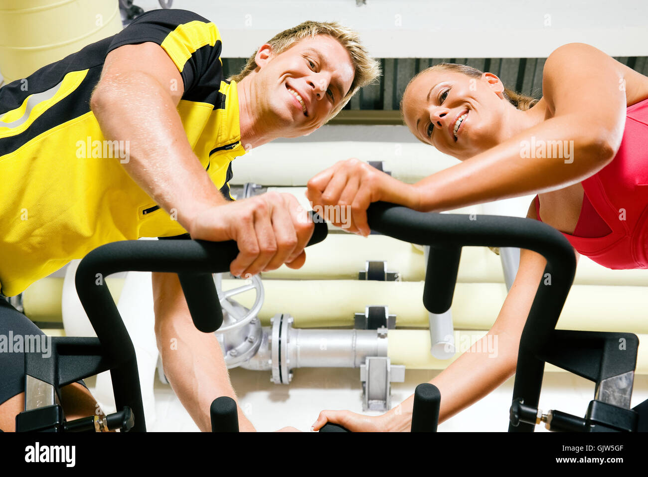 Man spinning wheel gym hi-res stock photography and images - Alamy