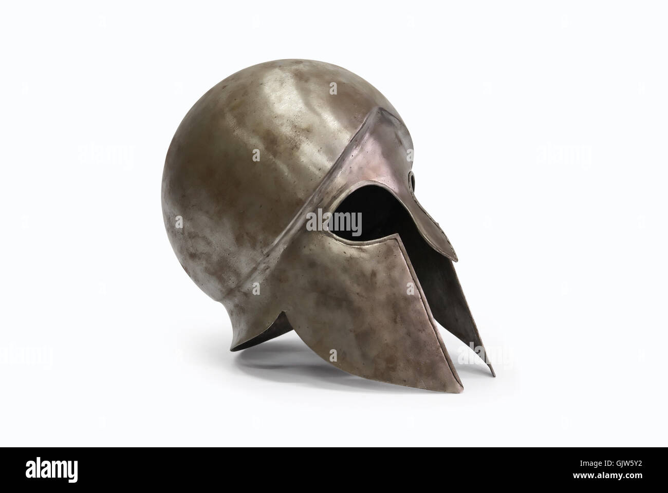 Ancient Greek military helmet on white background. Clipping path is ...