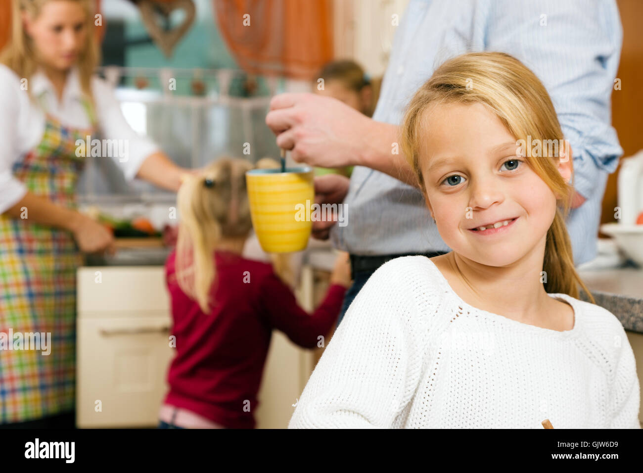 Woman cooking meal children school hi-res stock photography and images ...
