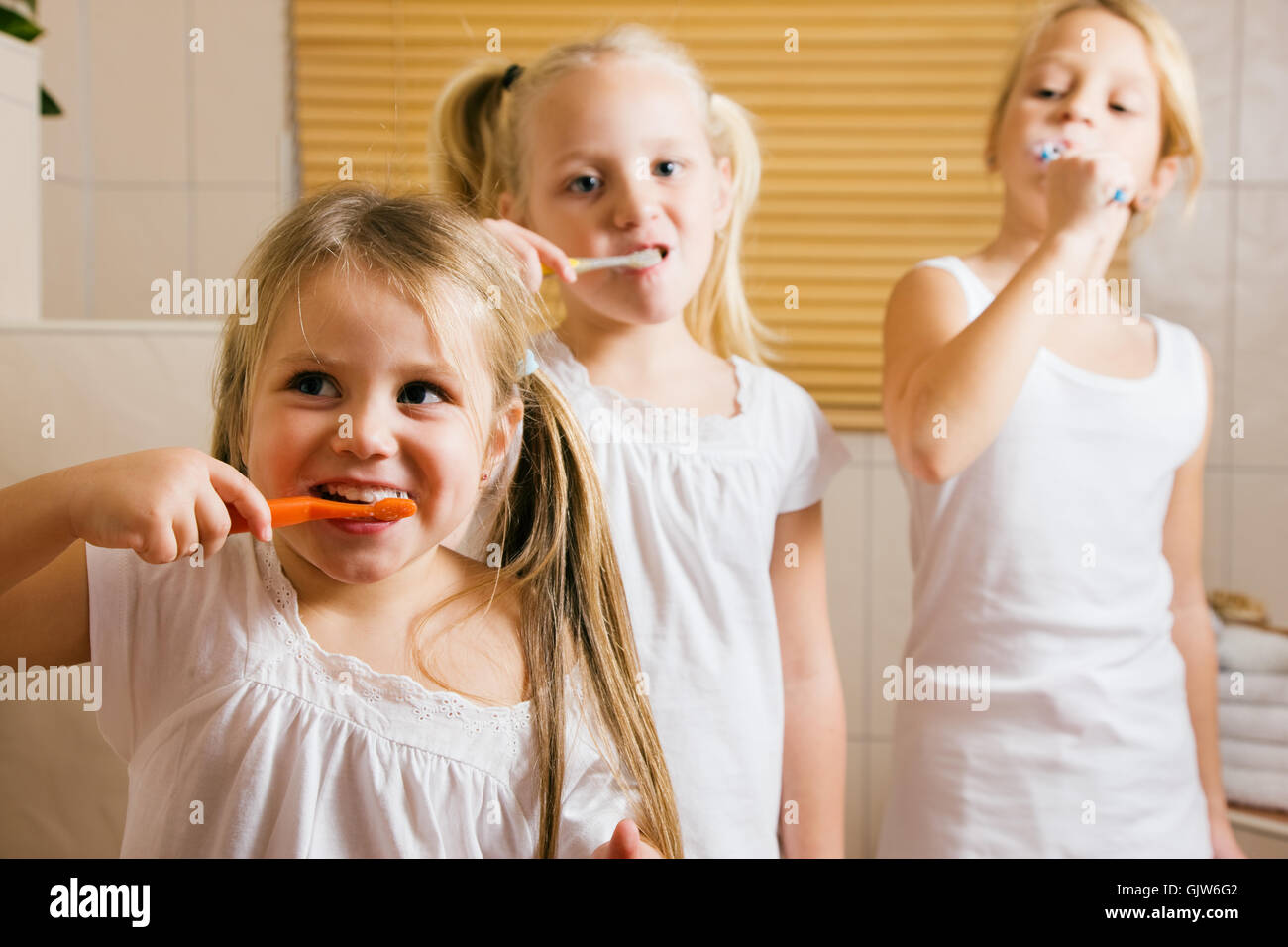 teeth furbish sisters Stock Photo - Alamy