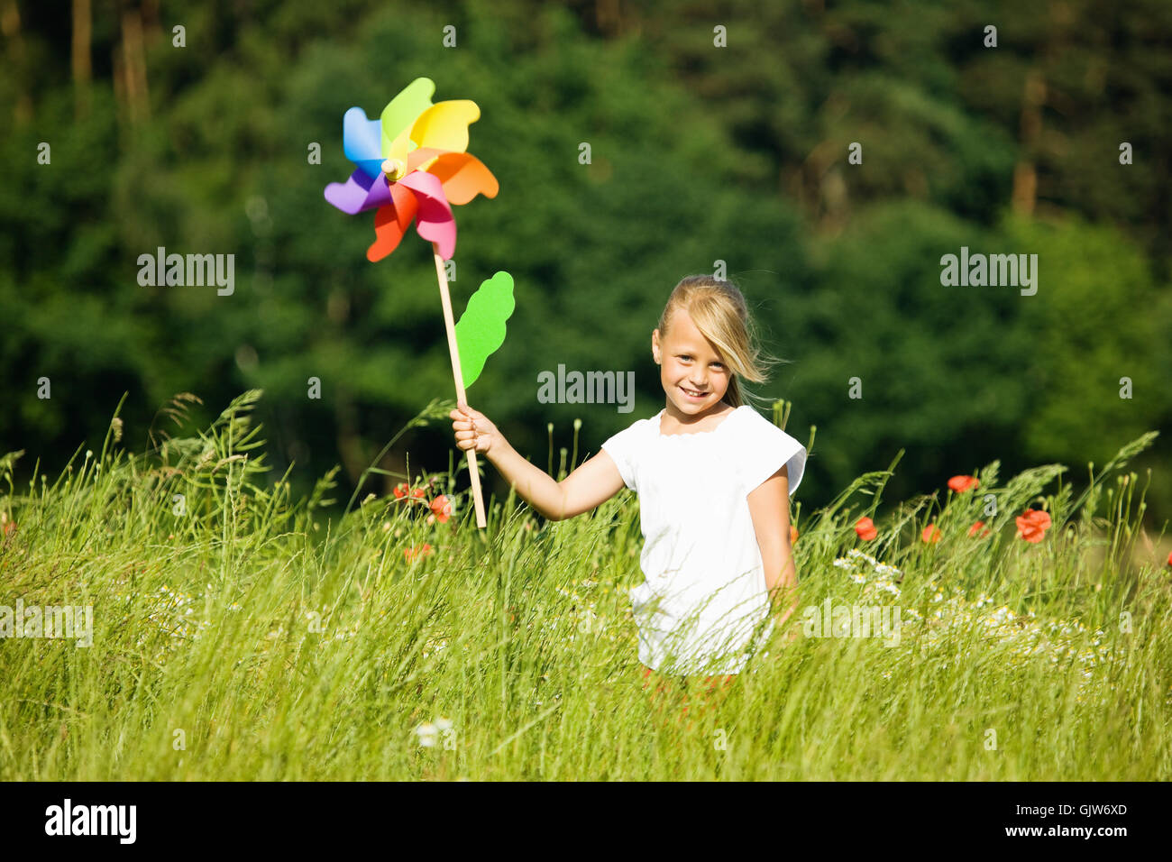 girl with pinwheel Stock Photo - Alamy