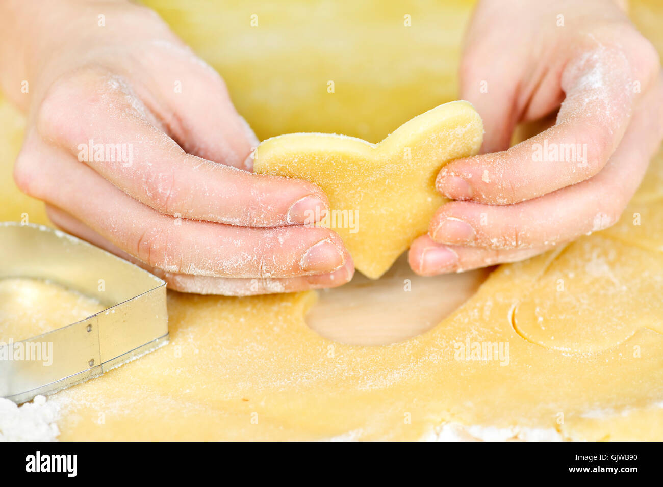 hand hands biscuits Stock Photo - Alamy