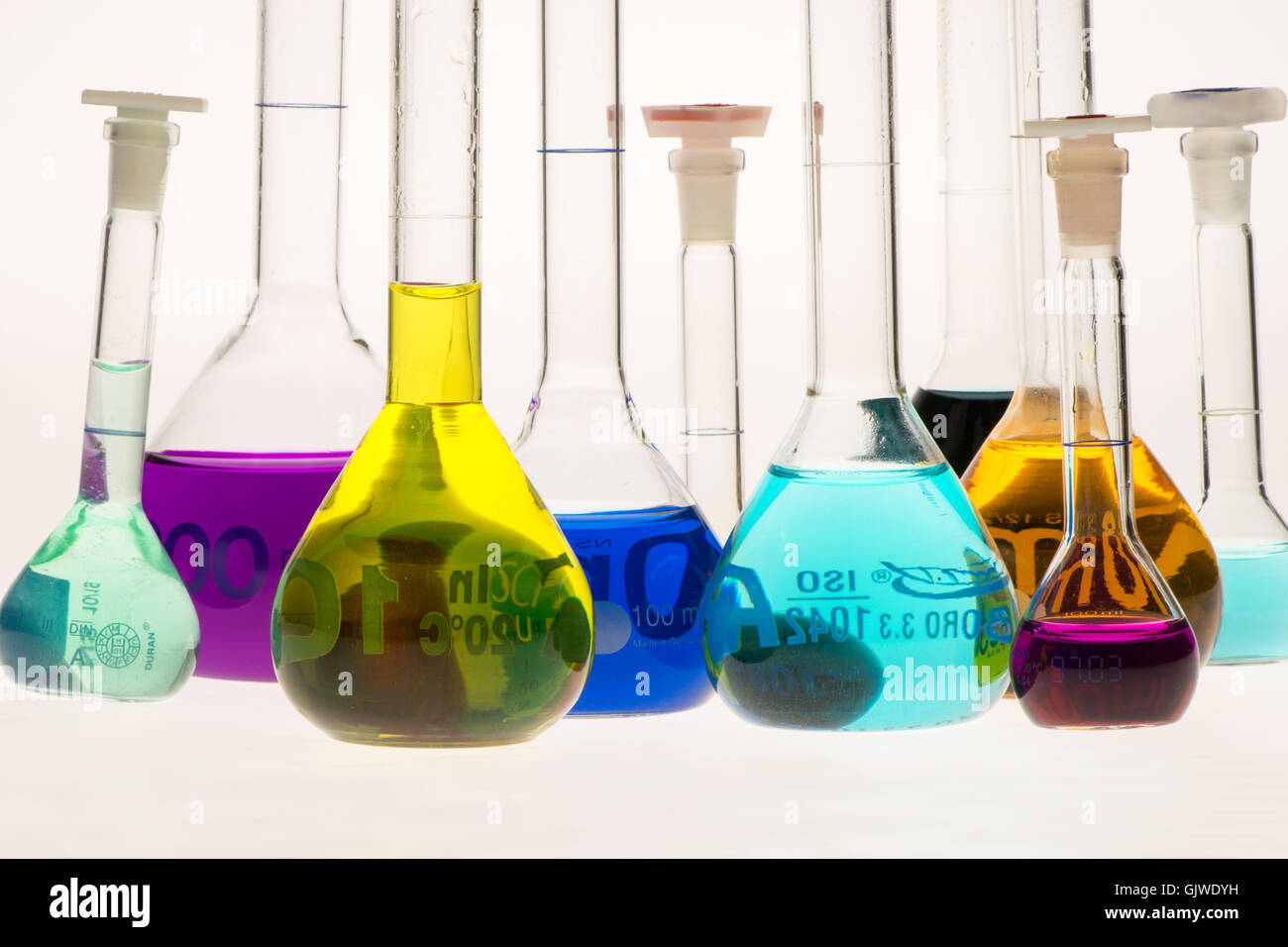 transparent chemical flasks with colored liquids Stock Photo - Alamy