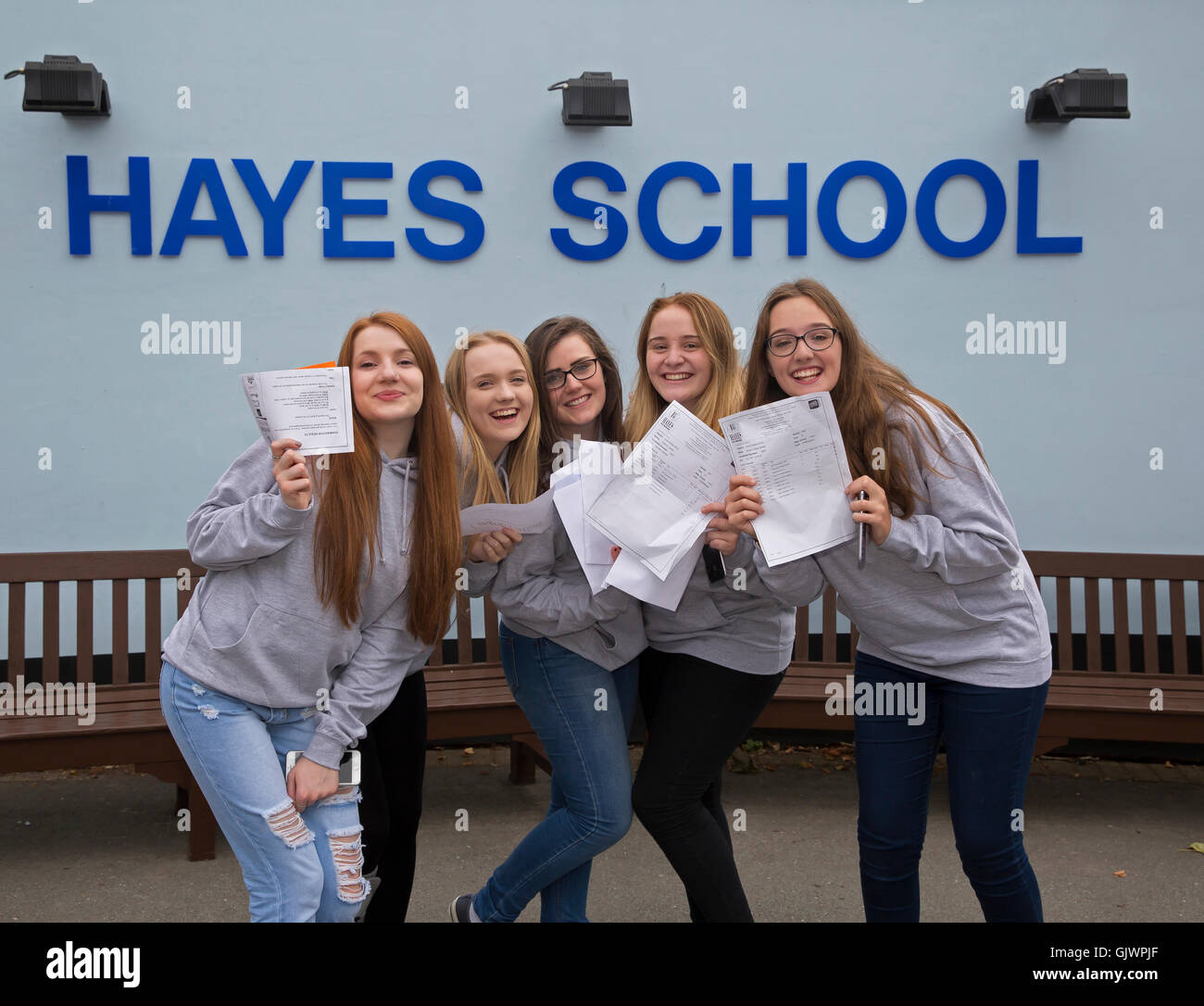 Hayes, UK. 18th Aug, 2016. Students jump for joy with their A Level ...