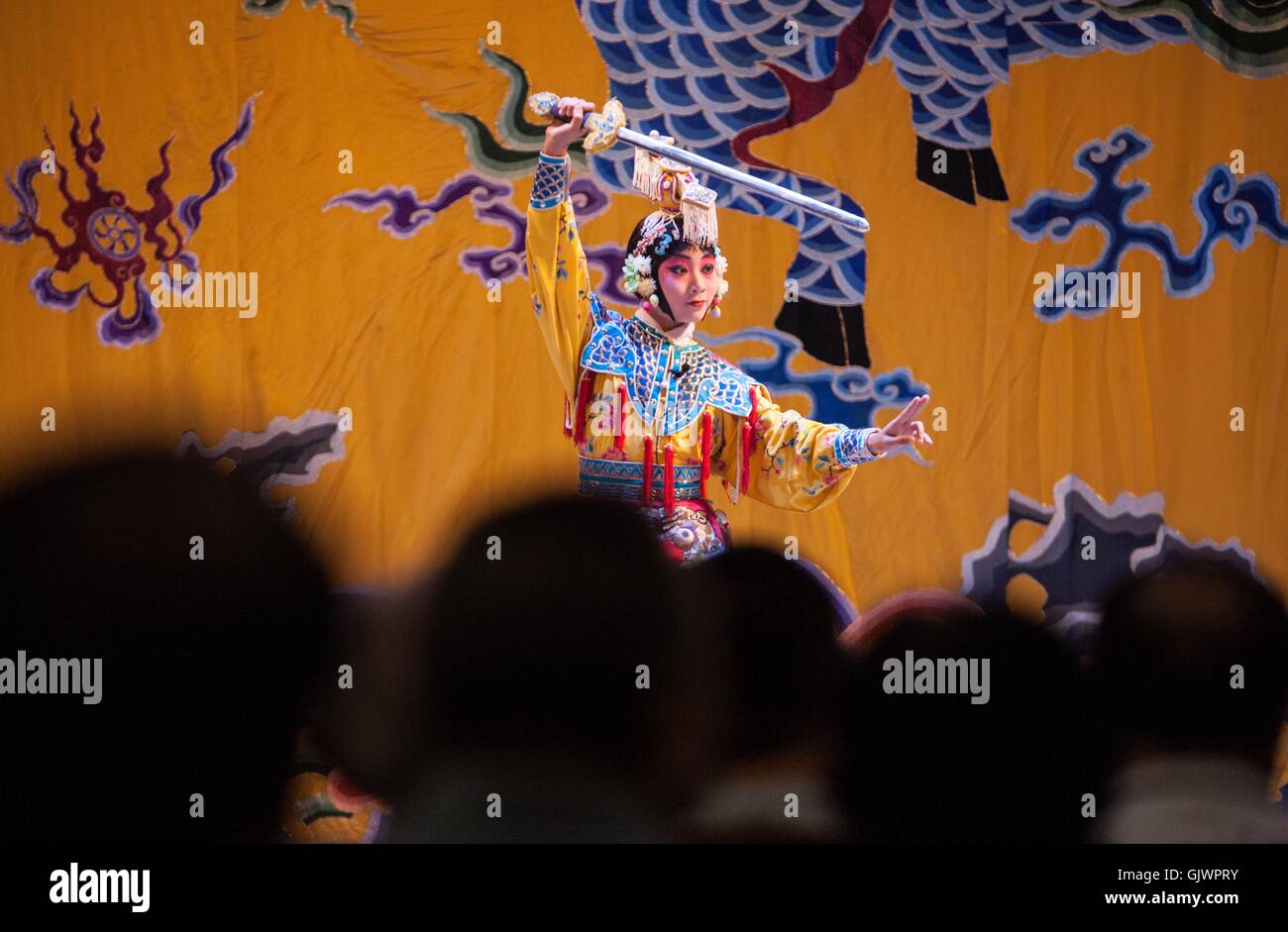 Beijing, China. 18th Aug, 2016. An artist performs Peking Opera during ...