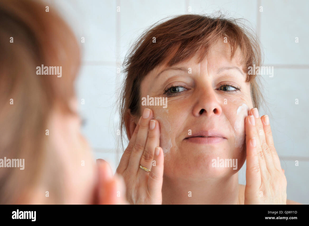 woman personal care cream Stock Photo - Alamy