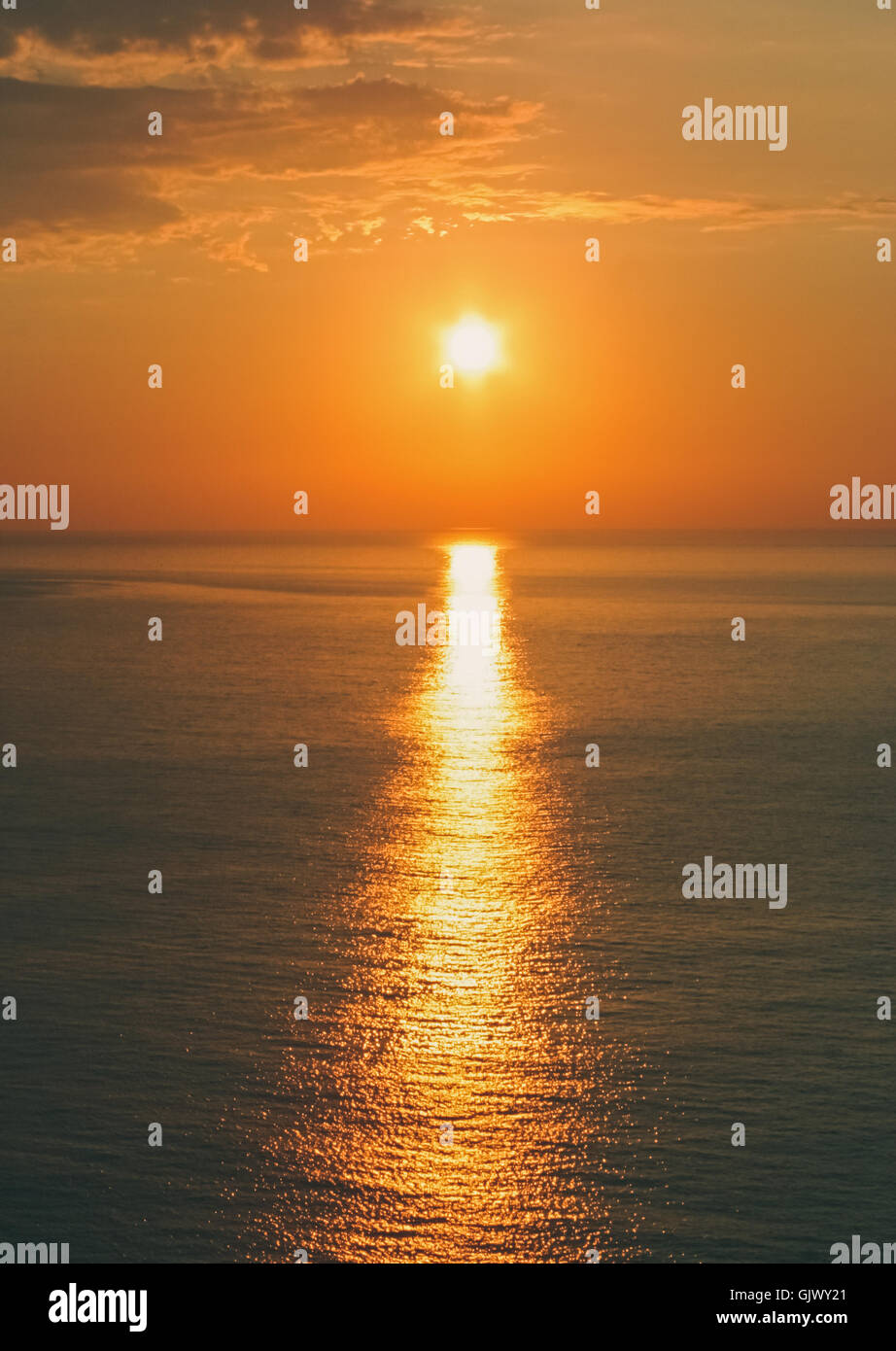 Amazing sunset by the sea Stock Photo - Alamy