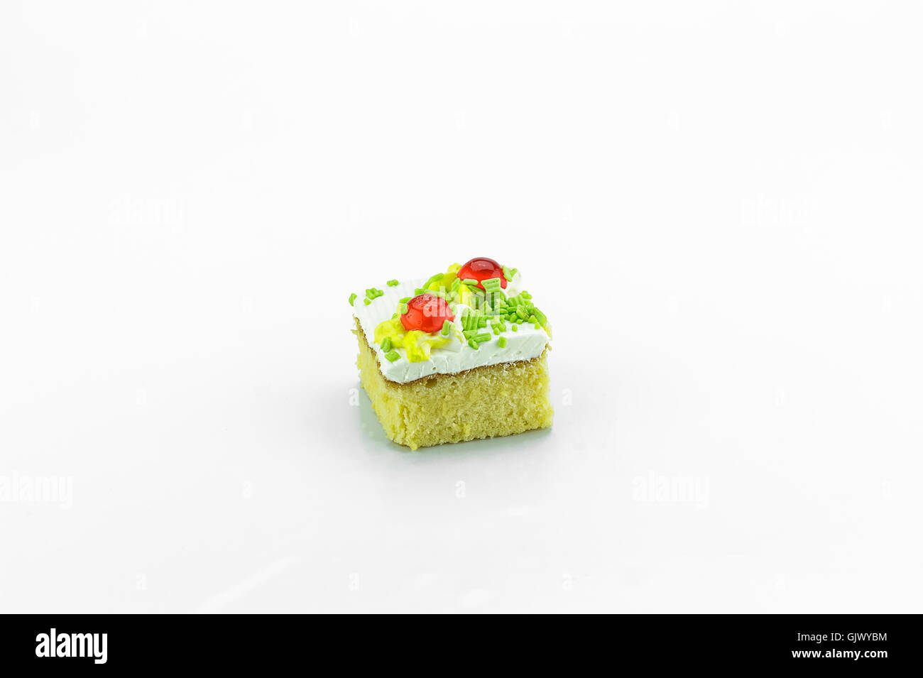 mini Cream cake on white background Stock Photo - Alamy