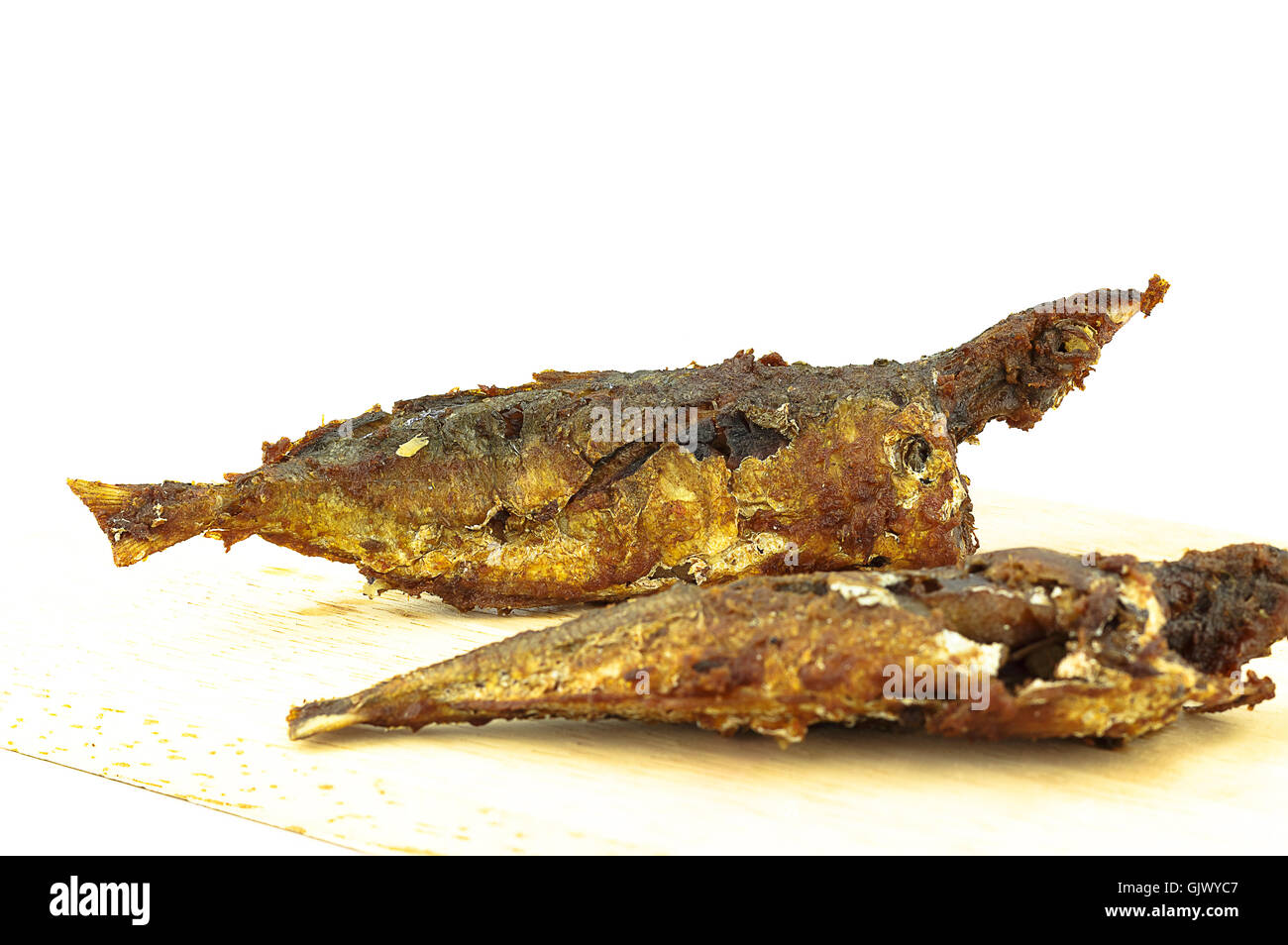 fish fry thai food on white background Stock Photo - Alamy