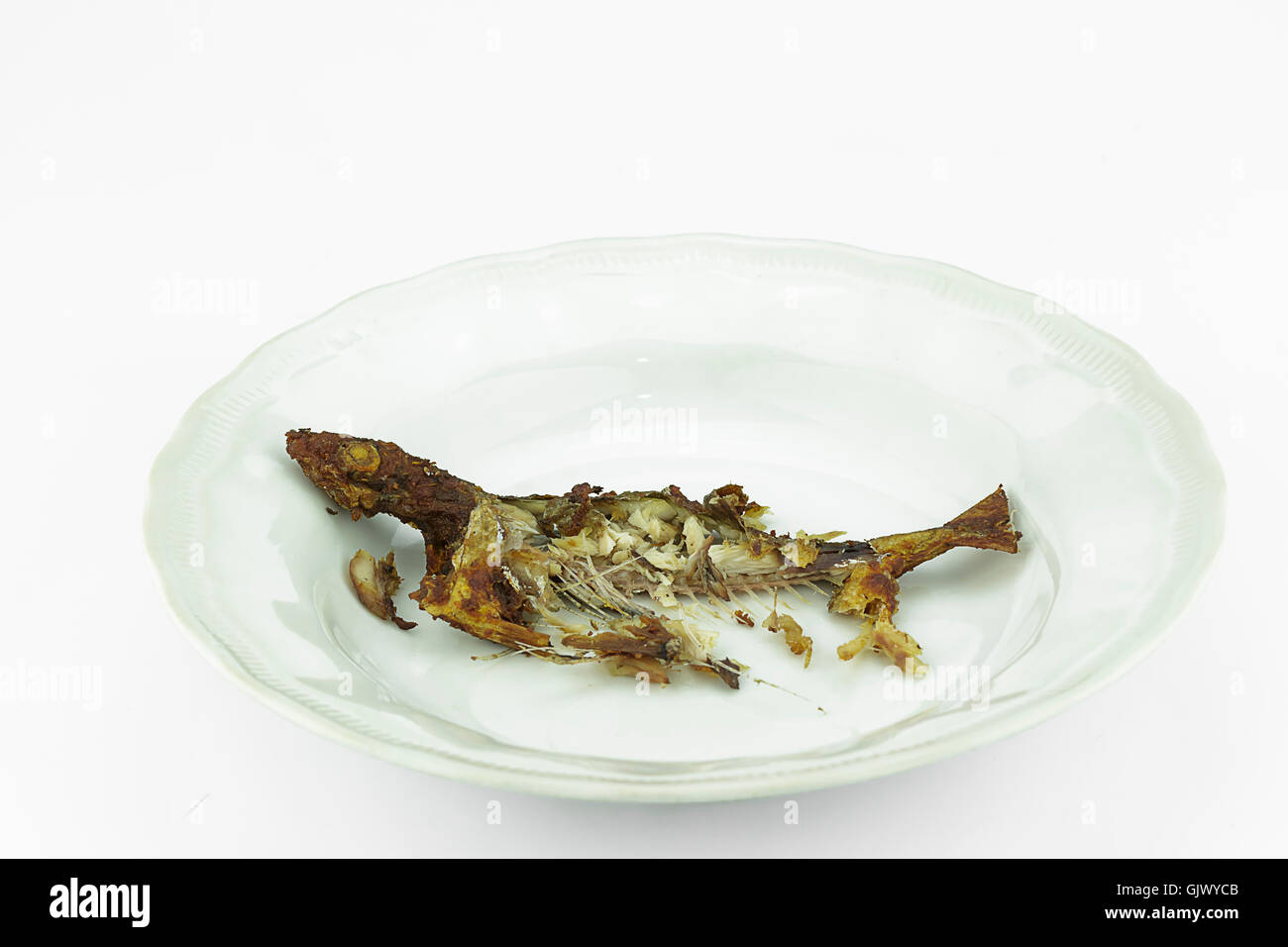 Fried fish bones hi-res stock photography and images - Alamy