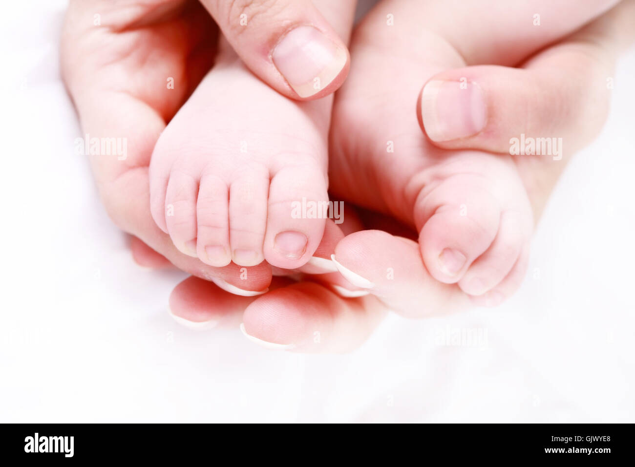 hand baby feet Stock Photo - Alamy