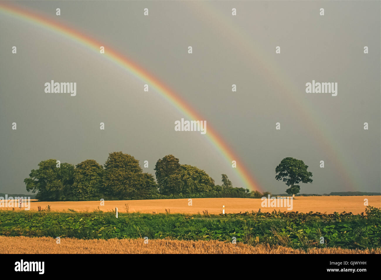 Rainbow into countryside hi-res stock photography and images - Alamy