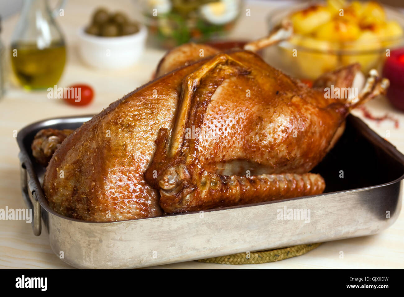 roast goose with peppers,fried potatoes Stock Photo - Alamy