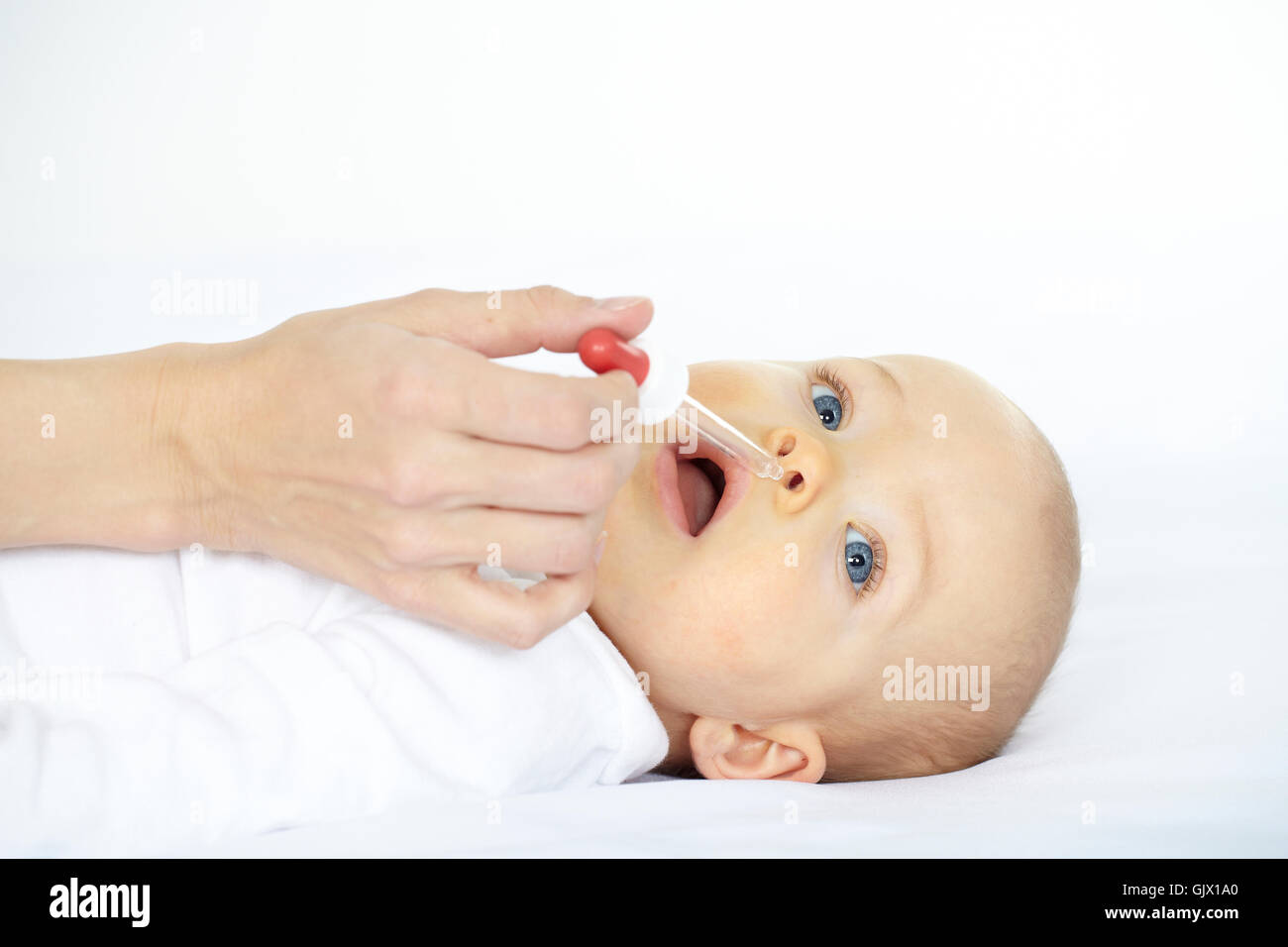 Baby nose drops hi-res stock photography and images - Alamy