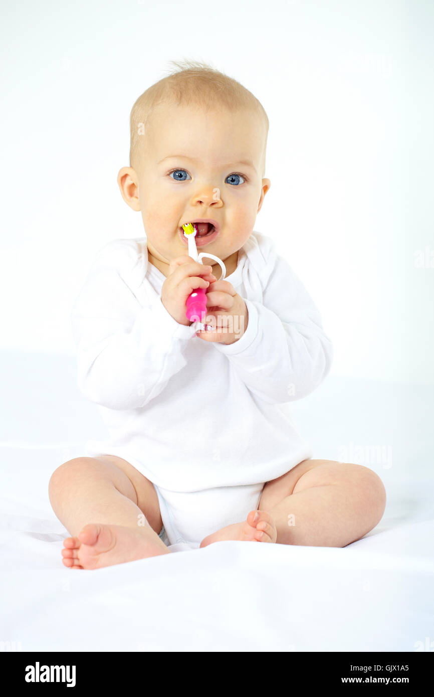 baby with toothbrush Stock Photo - Alamy
