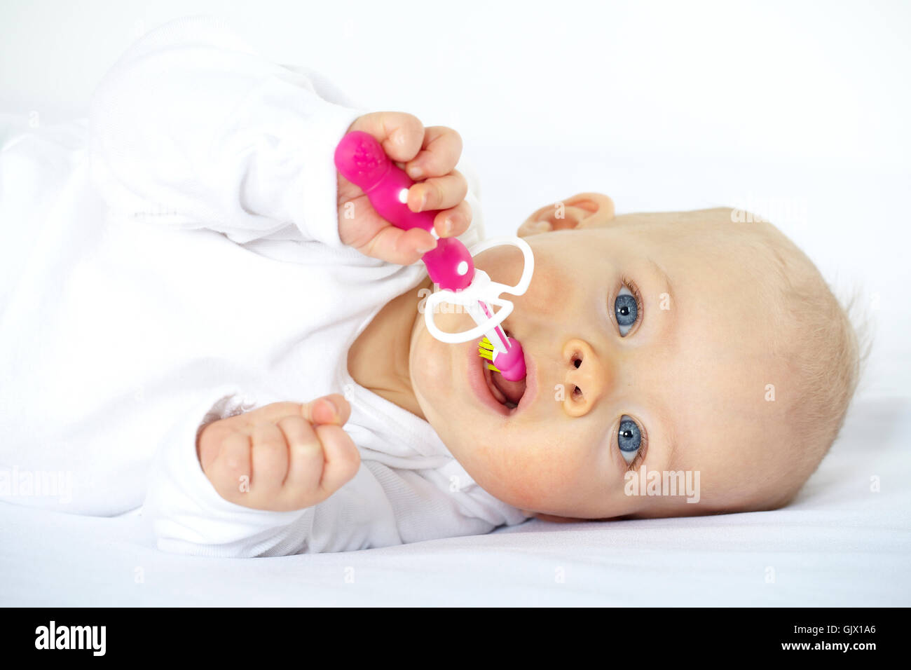 baby with toothbrush Stock Photo - Alamy