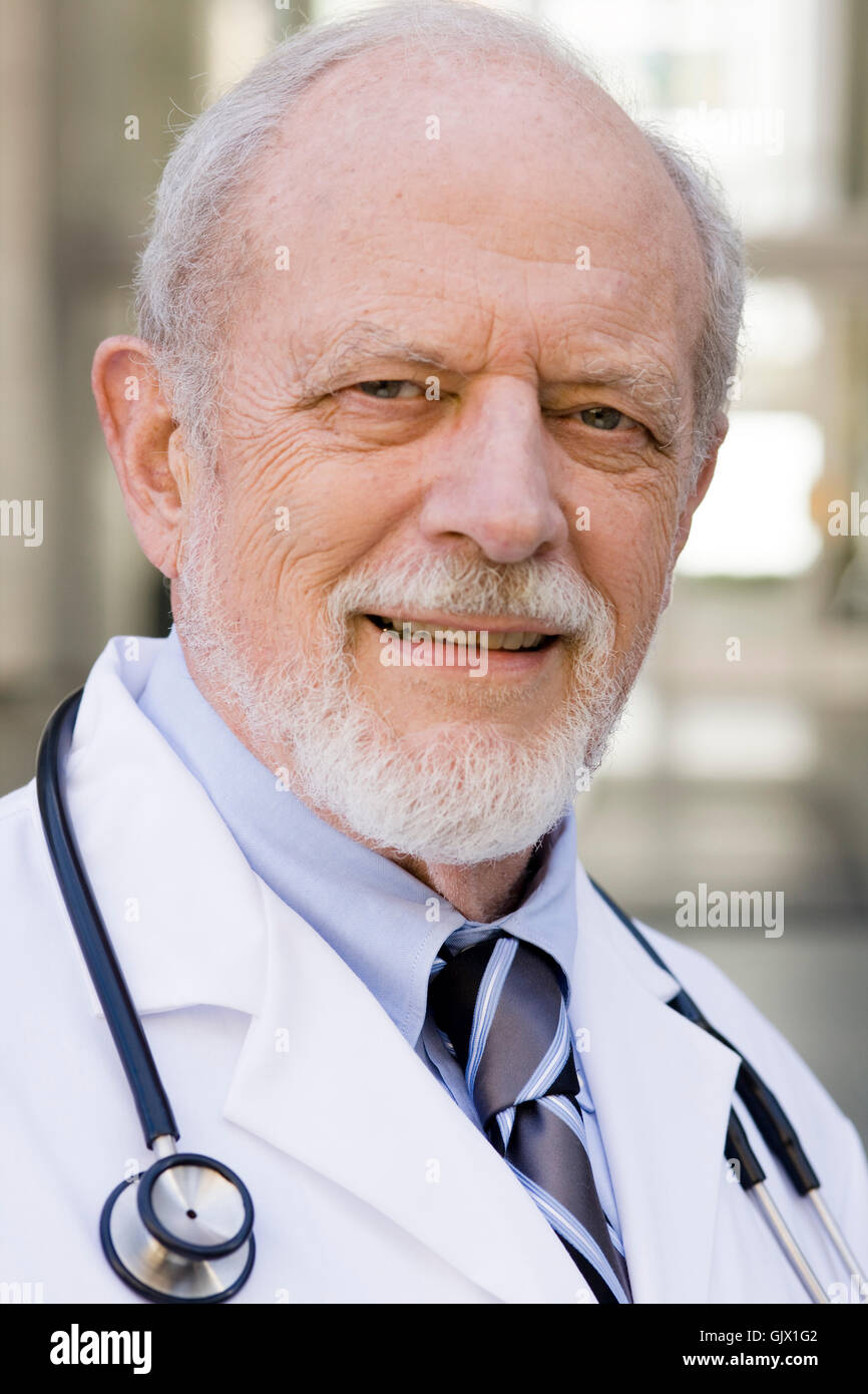 Joyful senior male doctor distinguished hi-res stock photography and ...