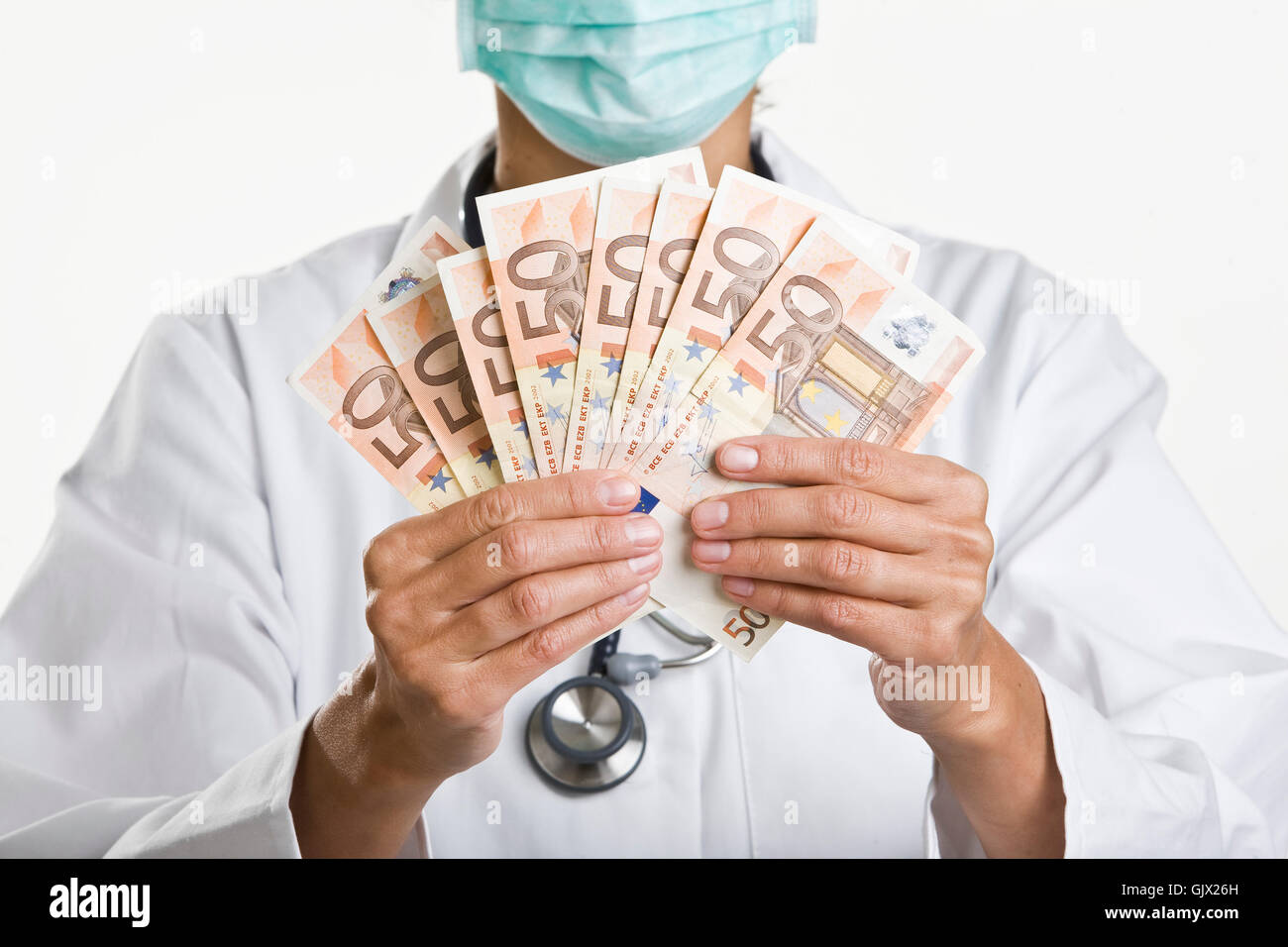 doctor with money Stock Photo - Alamy