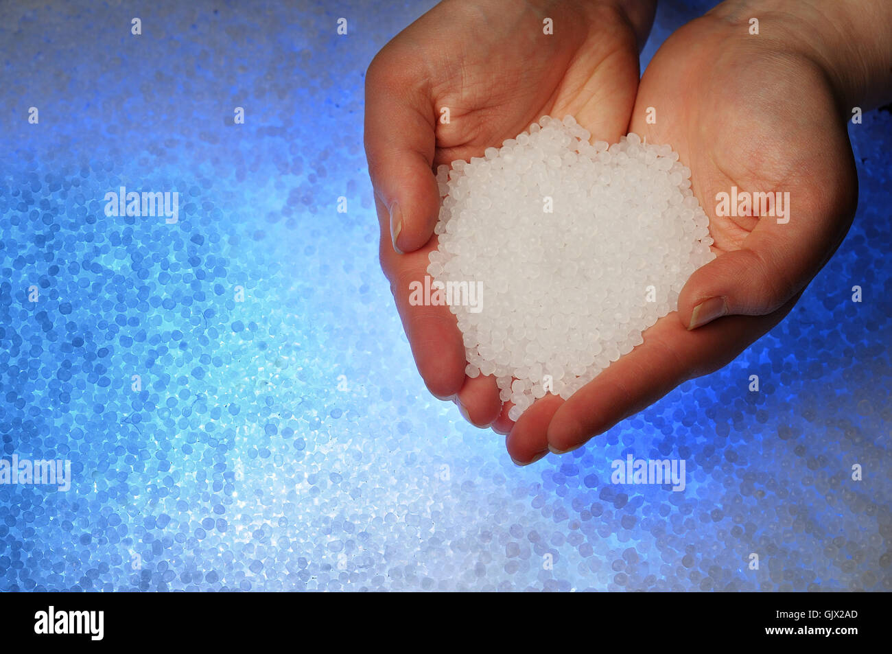 handful of plastic granulate Stock Photo - Alamy