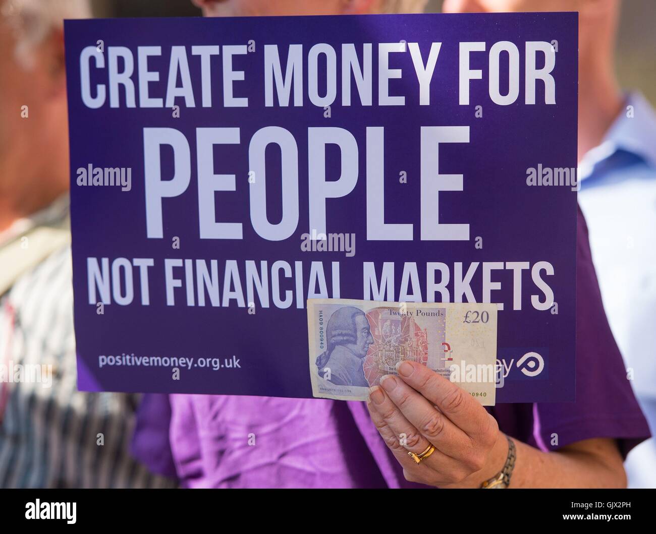 Demonstrators from the group Positive Money protest outside the Bank of ...