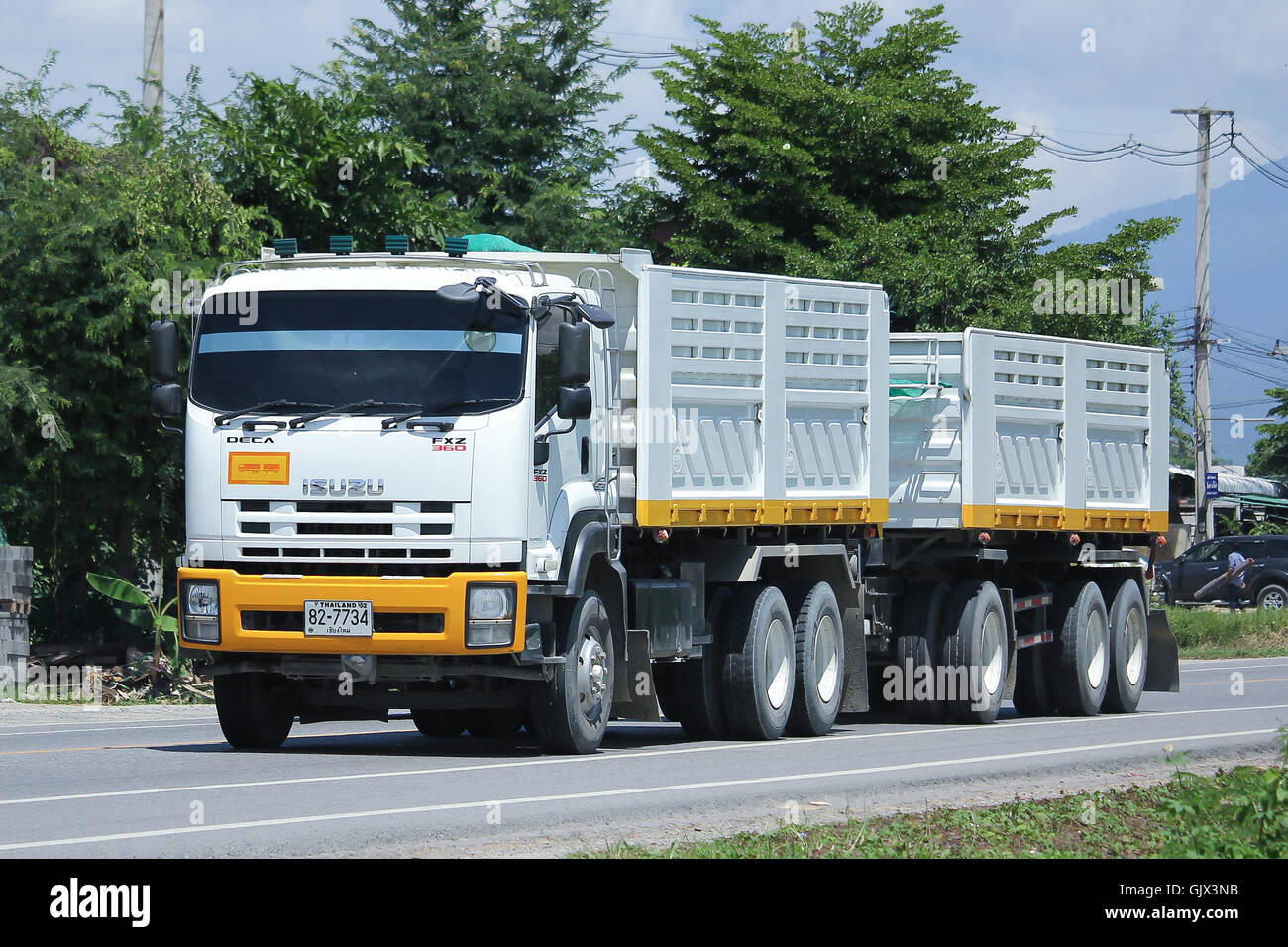 CHIANGMAI, THAILAND -JULY 27 2016: Isuzu Trailer dump truck of D stone ... CHIANGMAI, THAILAND -JULY 27 2016: Isuzu Trailer dump truck of D stone ...