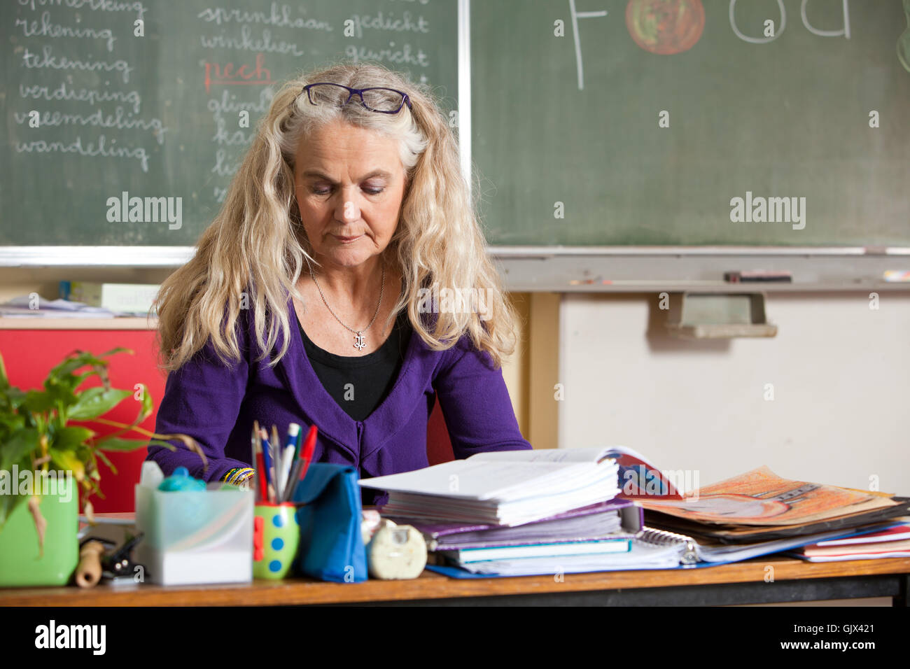 Busy classroom teacher hi-res stock photography and images - Alamy