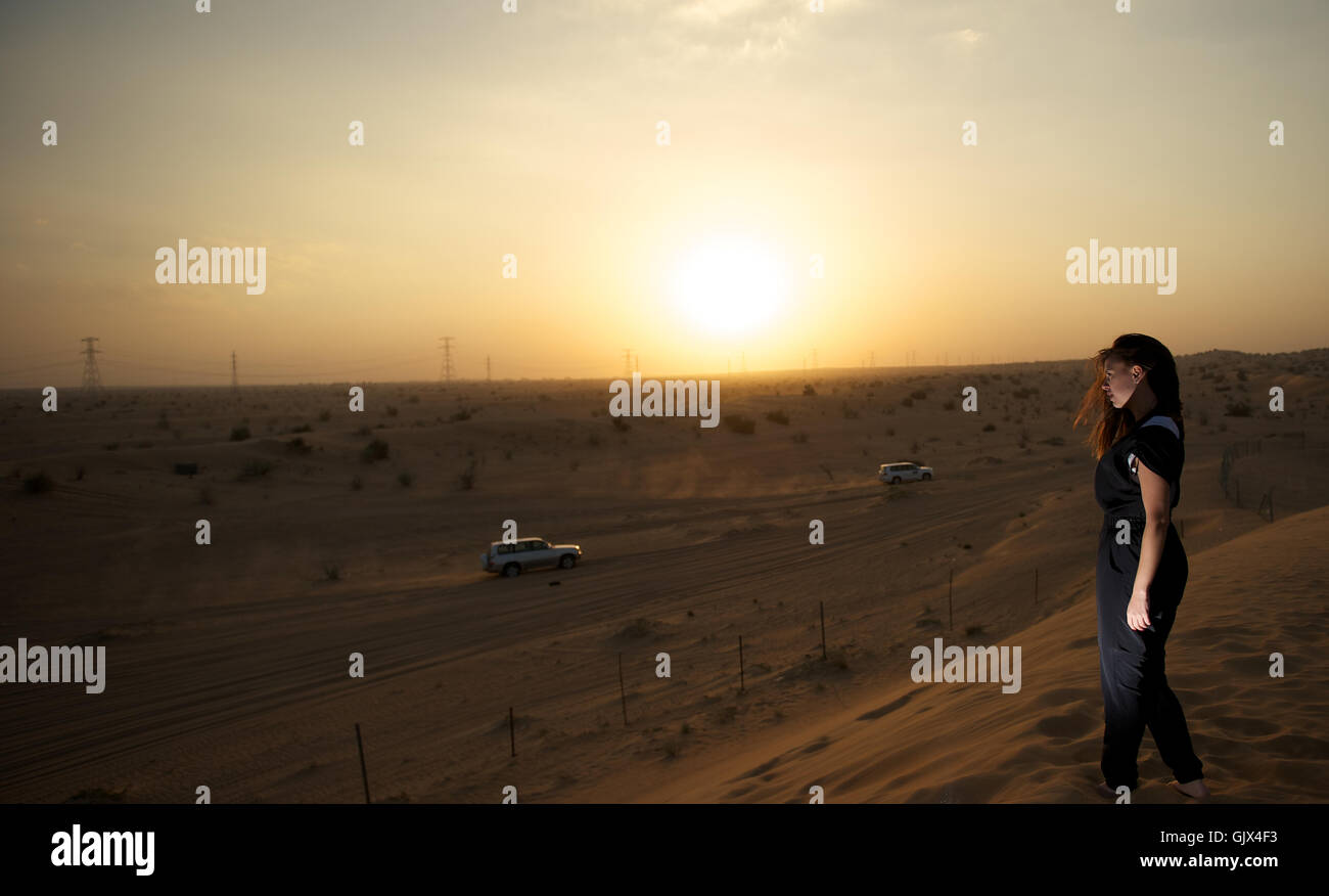 Woman in the desert Stock Photo - Alamy