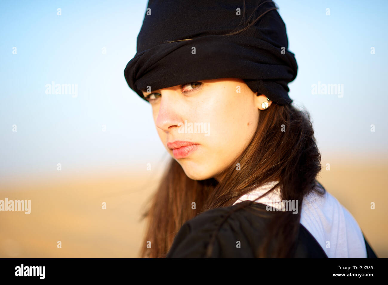 Woman in the desert Stock Photo - Alamy
