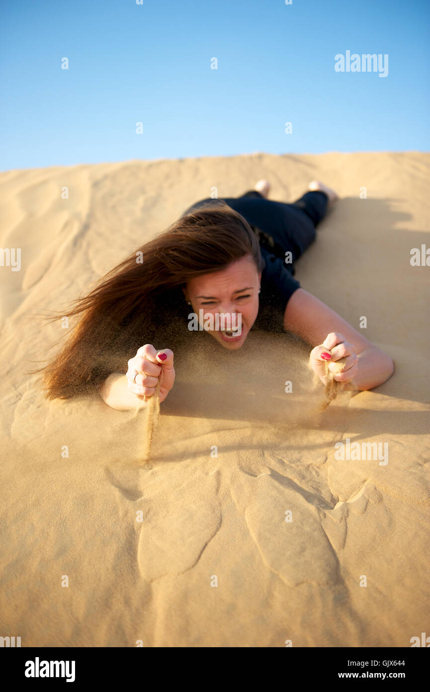 Woman in the desert Stock Photo - Alamy