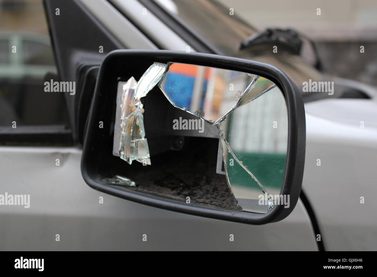 Broken rear mirror Stock Photo - Alamy