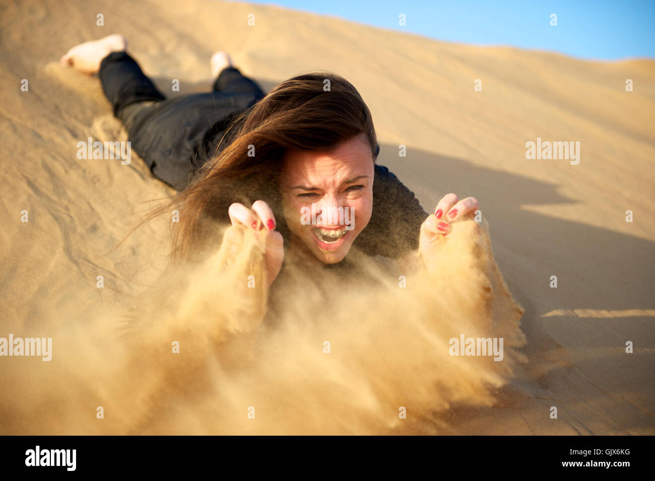 Woman in the desert Stock Photo - Alamy