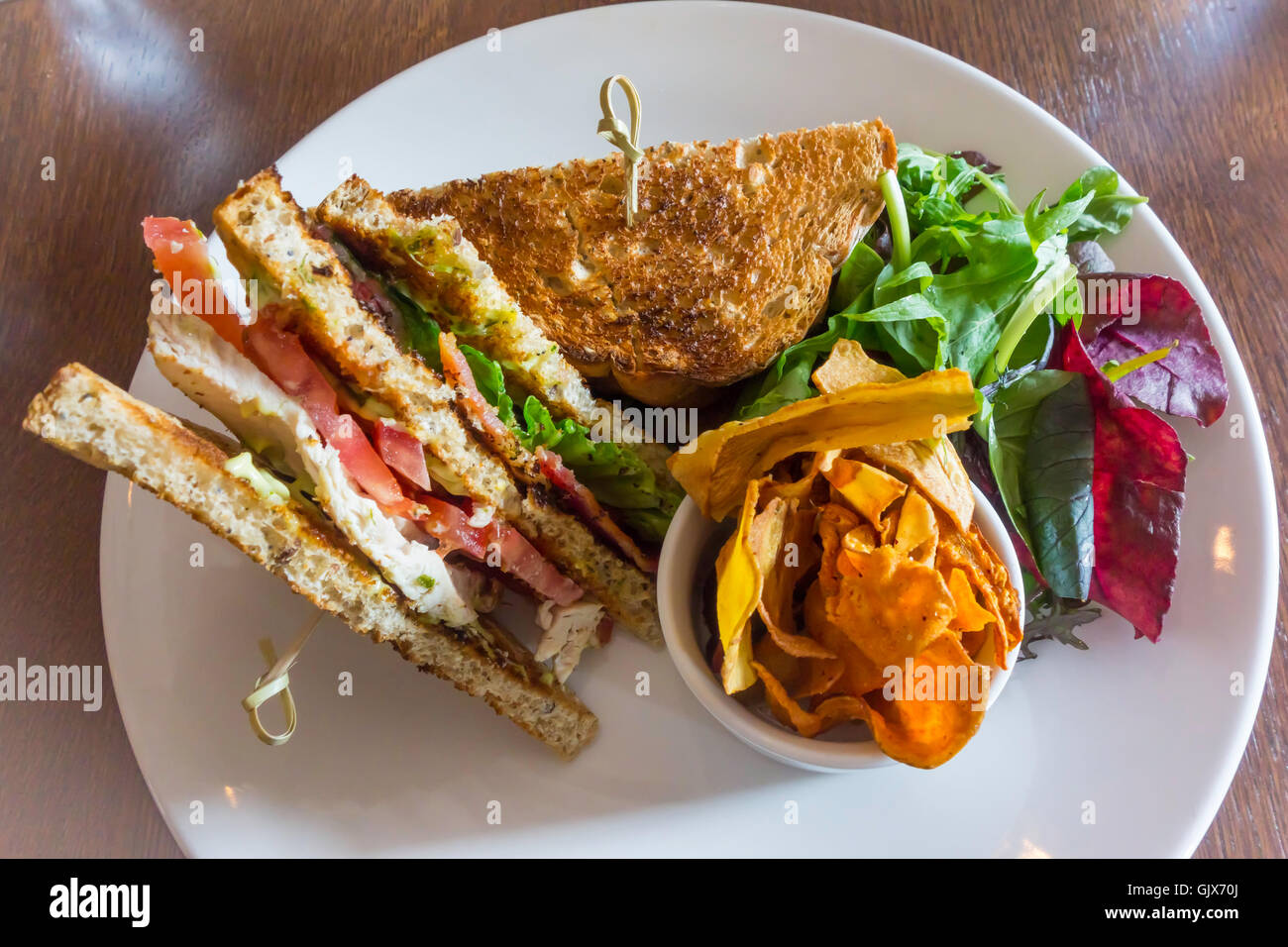 Traditional Club Sandwich with toasted bread bacon chicken salad and ...