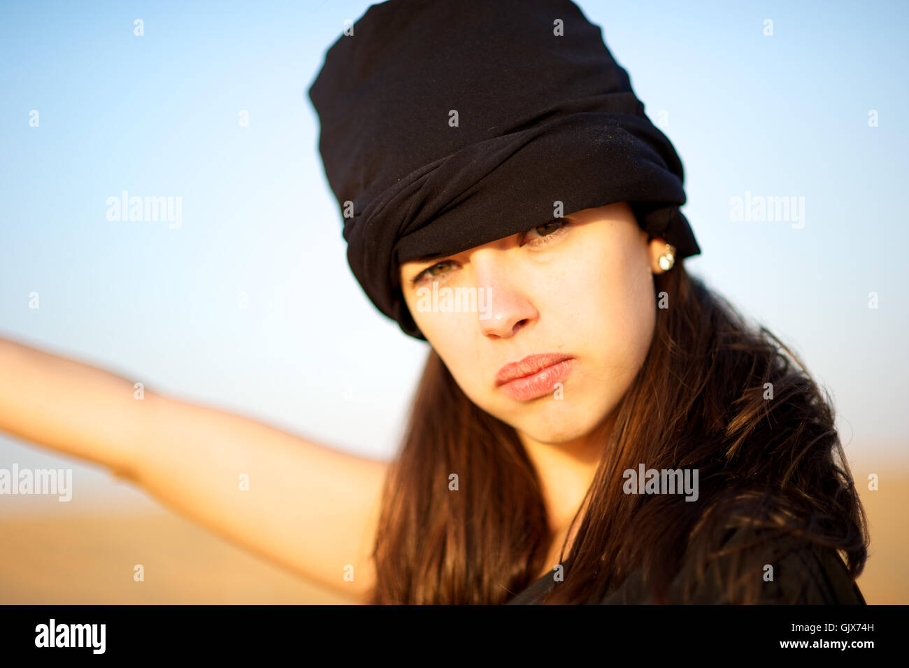 Woman in the desert Stock Photo - Alamy
