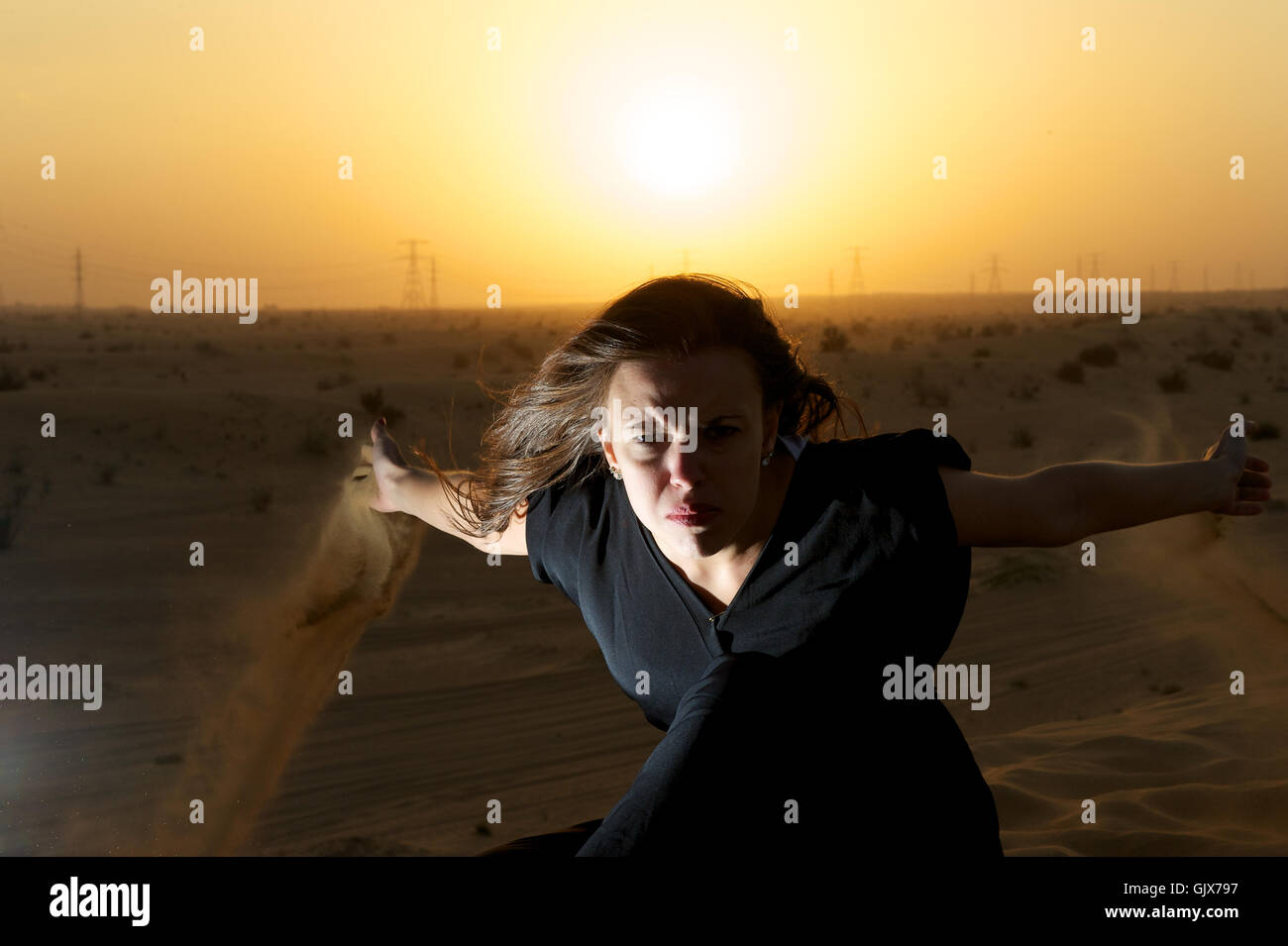 Woman in the desert Stock Photo - Alamy