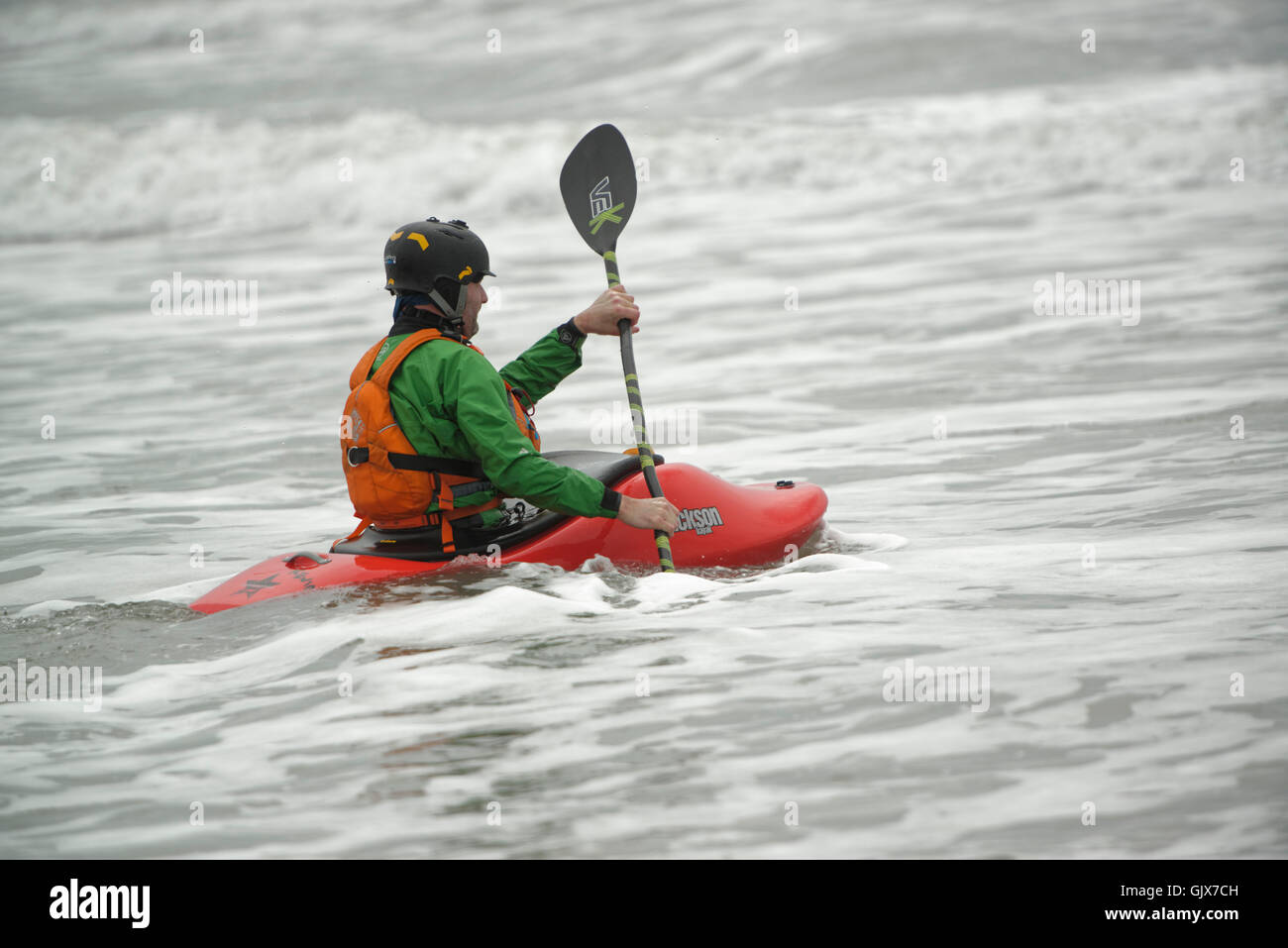 Kayaking on the beach in the surf at Porth Neigwl Stock Photo - Alamy
