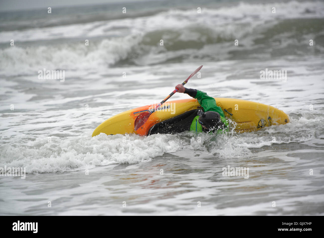 Mid adult man falling out of kayak Stock Photo: 114902754 - Alamy