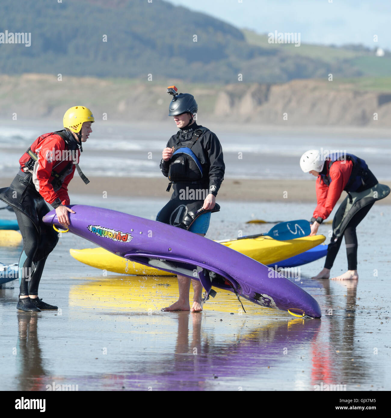 Kayaking on the beach in the surf at Porth Neigwl Stock Photo - Alamy