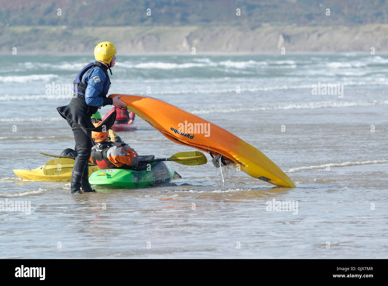 Kayaking on the beach in the surf at Porth Neigwl Stock Photo - Alamy