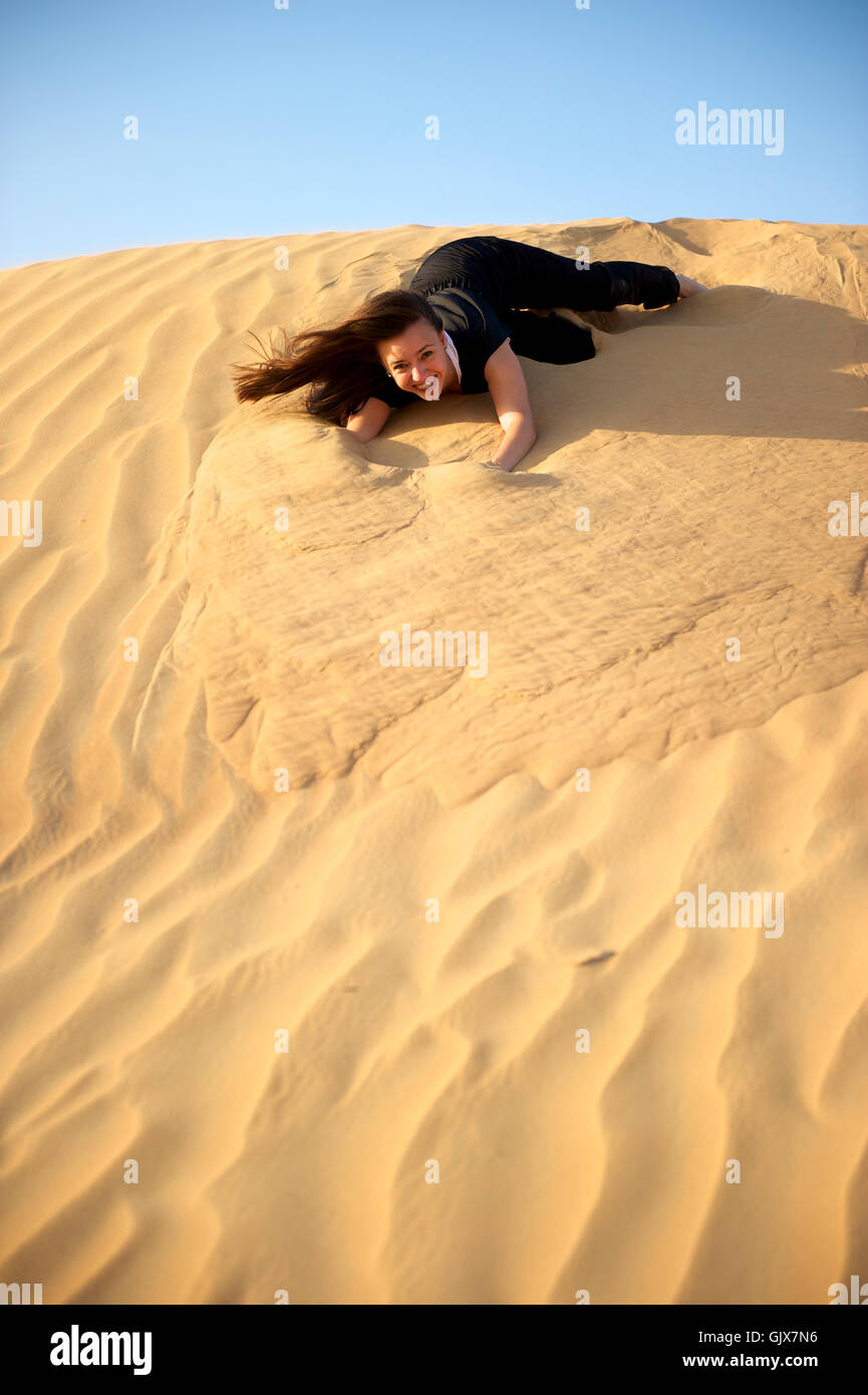 Woman in the desert Stock Photo - Alamy