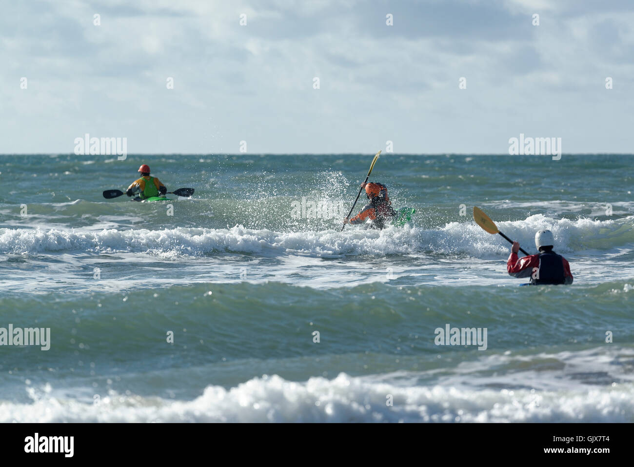Kayaking on the beach in the surf at Porth Neigwl Stock Photo - Alamy