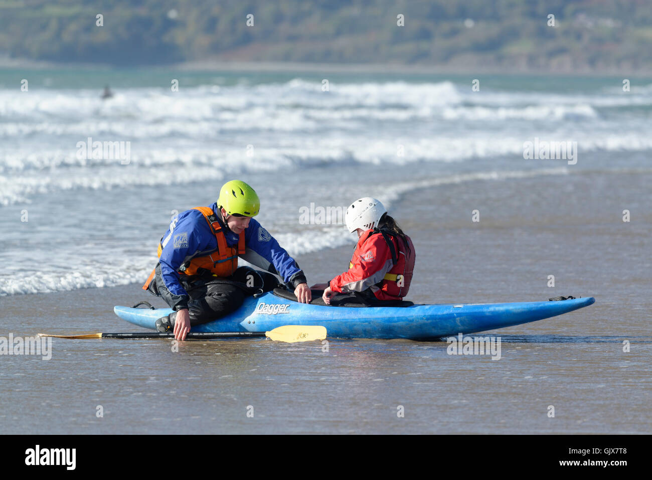 Kayaking on the beach in the surf at Porth Neigwl Stock Photo - Alamy