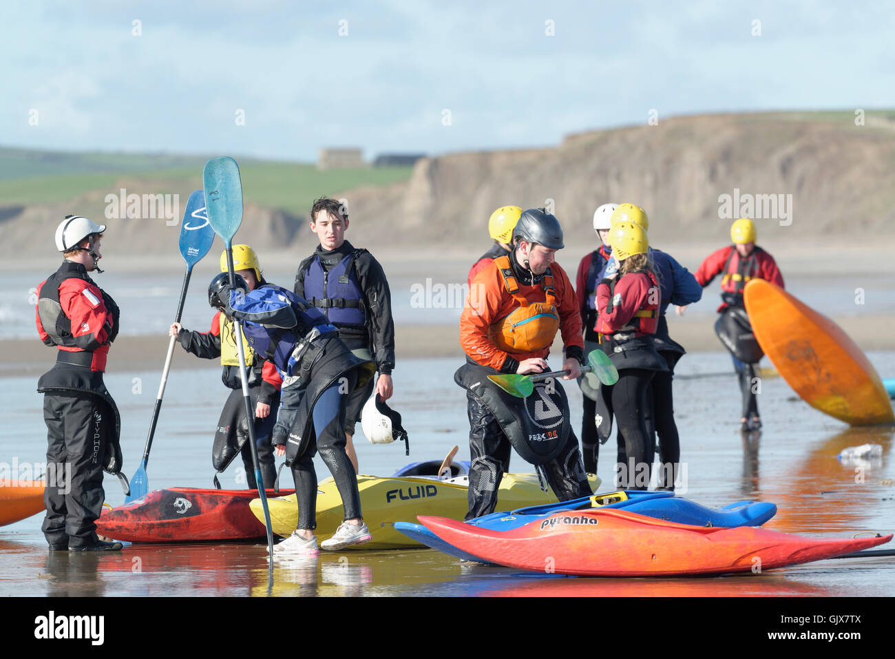 Kayaking on the beach in the surf at Porth Neigwl Stock Photo - Alamy