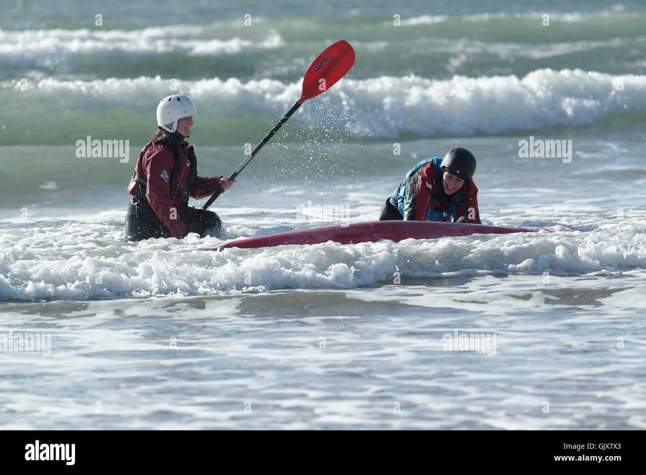 Kayaking on the beach in the surf at Porth Neigwl Stock Photo - Alamy
