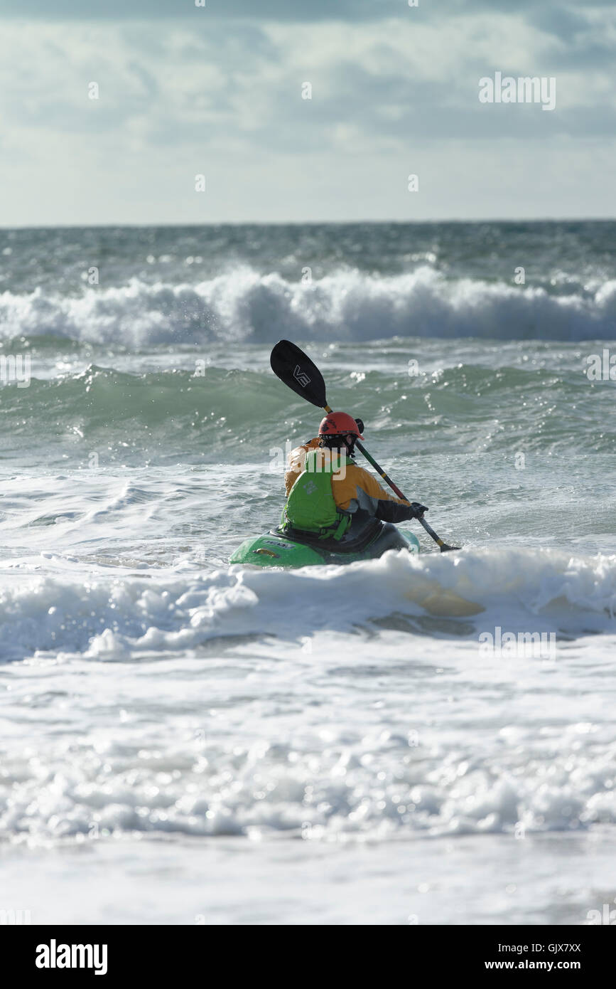 Kayaking on the beach in the surf at Porth Neigwl Stock Photo - Alamy