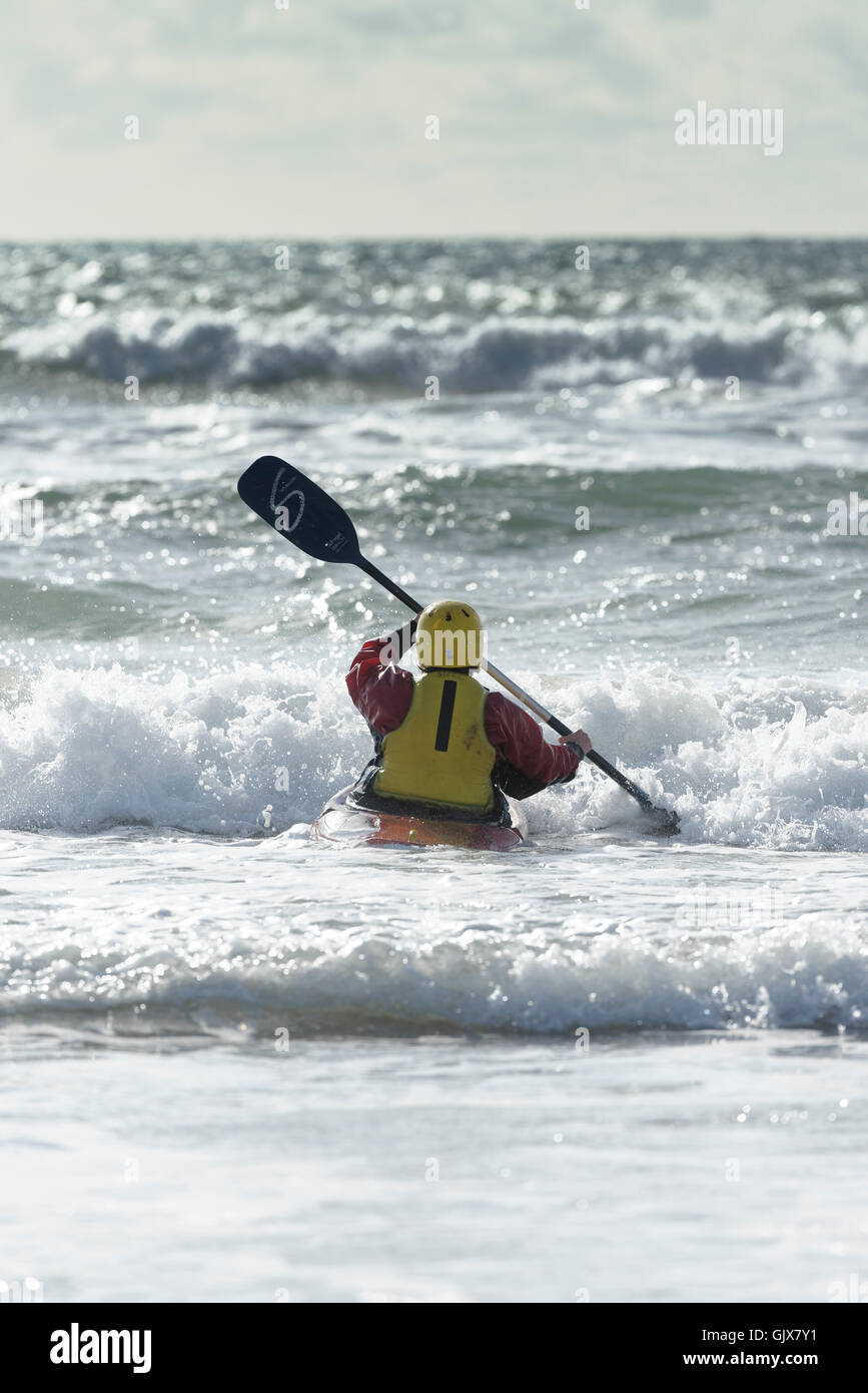 Kayaking on the beach in the surf at Porth Neigwl Stock Photo - Alamy