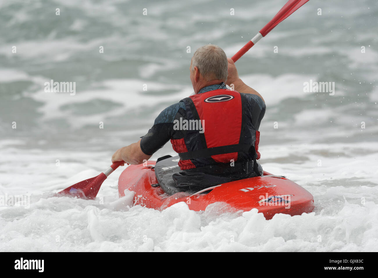 Kayaking on the beach in the surf at Porth Neigwl Stock Photo - Alamy