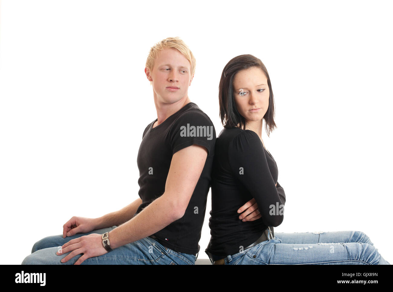 couple conflict back on back Stock Photo - Alamy