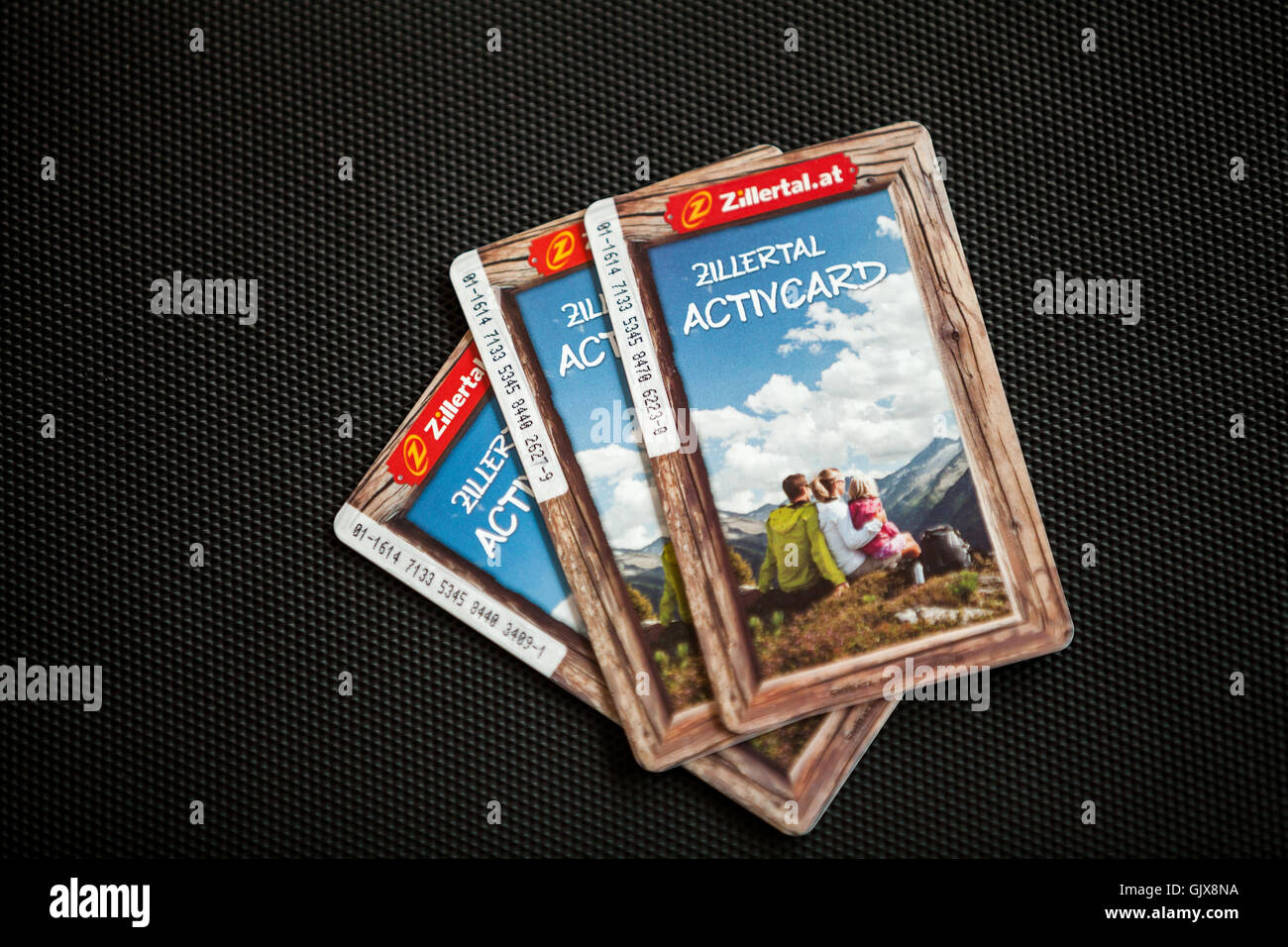 Three Zillertal Activcard on black background Stock Photo - Alamy