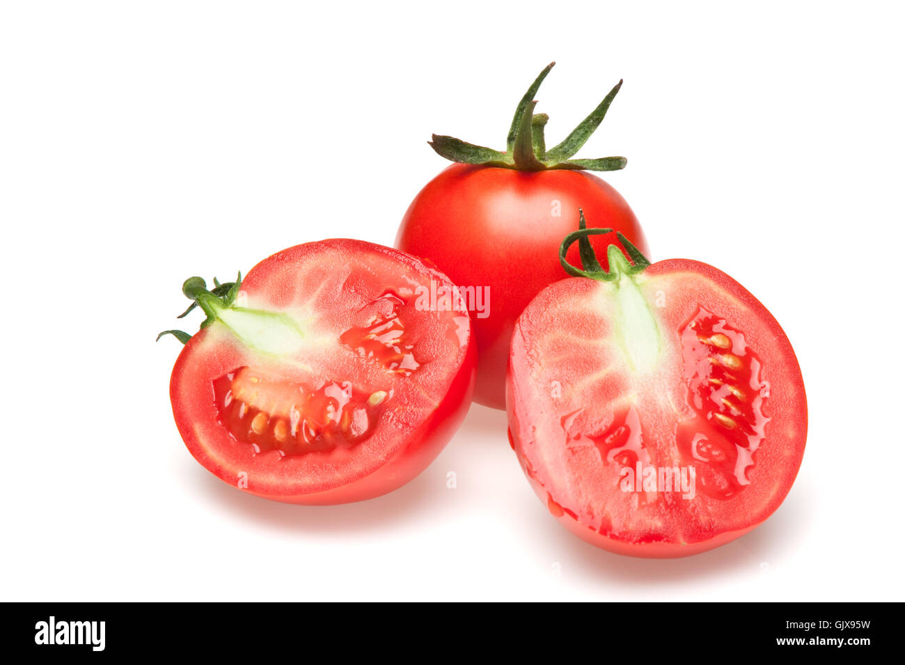 The cut tomatoes Stock Photo - Alamy