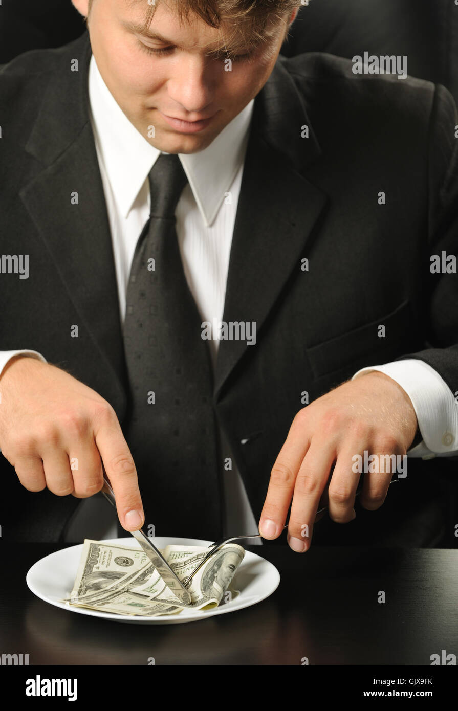 The businessman having dinner dollars Stock Photo - Alamy